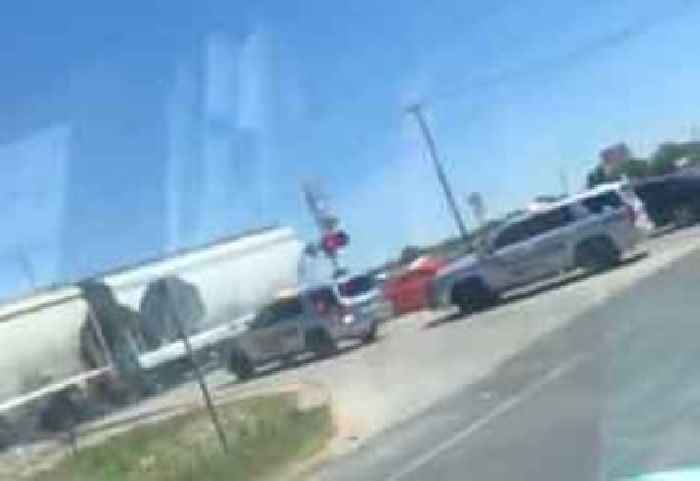 Cop Car Tries His Luck Jumping a Railroad Crossing and - One News Page