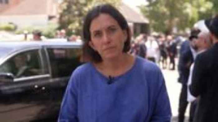 BBC outside Rabbi Schlanger's funeral as mourners pay - One News Page