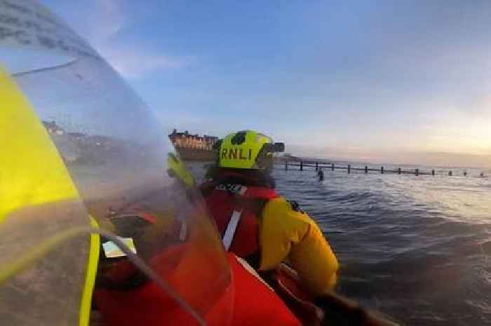 Beachgoer rescued after getting trapped in sinking - One News Page