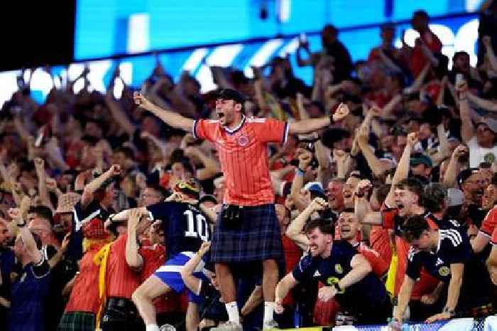 Tartan Army 'adopt' Boston dog Toby for one adorable - One News Page